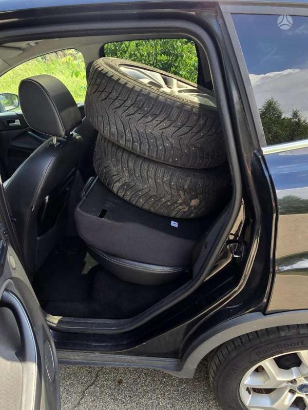 Black Ford Kuga 2008 in Panevezys, with an engine capacity of 2.00 L and mileage of 254 thousand km for 3600 €, photo 9 on AUTOMOTO.COM.LV