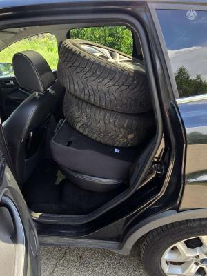 Black Ford Kuga 2008 in Panevezys, with an engine capacity of 2.00 L and mileage of 254 thousand km for 3600 €, photo 10 on AUTOMOTO.COM.LV