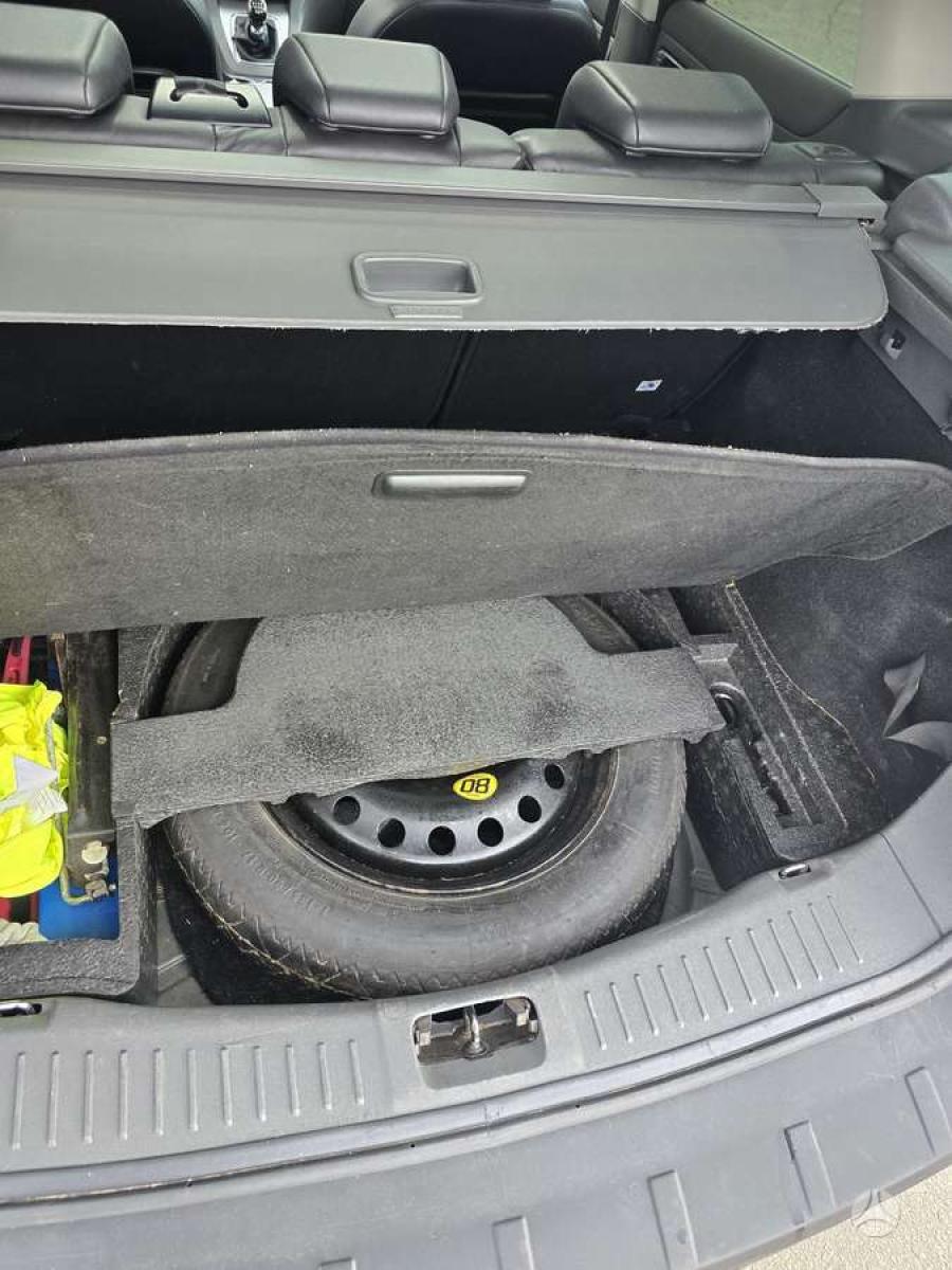 Black Ford Kuga 2008 in Panevezys, with an engine capacity of 2.00 L and mileage of 254 thousand km for 3600 €, photo 13 on AUTOMOTO.COM.LV