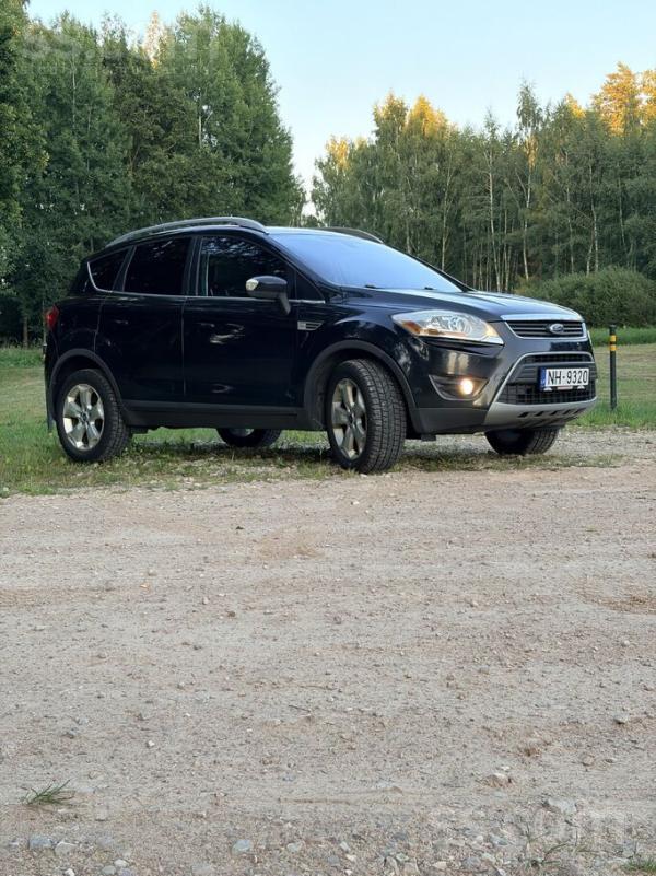 Black Ford Kuga 2008 in Riga, with an engine capacity of 2.00 L and mileage of 303 thousand km for 5500 €, photo 1 on AUTOMOTO.COM.LV