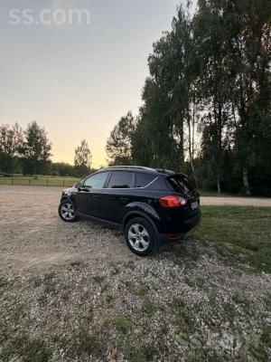Black Ford Kuga 2008 in Riga, with an engine capacity of 2.00 L and mileage of 303 thousand km for 5500 €, photo 6 on AUTOMOTO.COM.LV