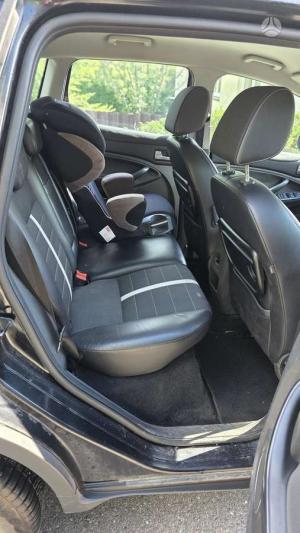 Black Ford Kuga 2008 in Vilnius, with an engine capacity of 2.00 L and mileage of 238 thousand km for 3200 €, photo 9 on AUTOMOTO.COM.LV