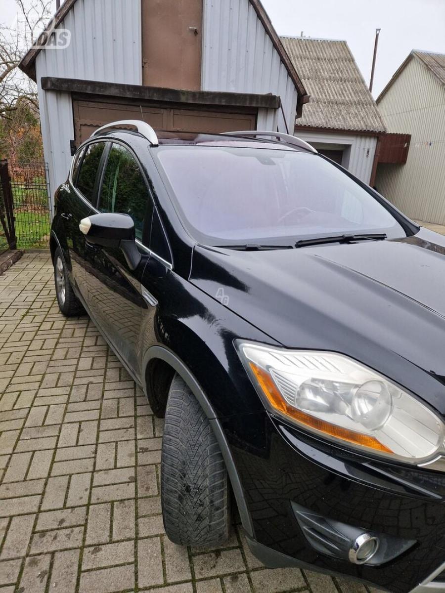 Black Ford Kuga 2009 in Siauliai, with an engine capacity of 2.00 L and mileage of 333 thousand km for 5200 €, photo 4 on AUTOMOTO.COM.LV