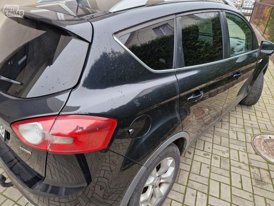 Black Ford Kuga 2009 in Siauliai, with an engine capacity of 2.00 L and mileage of 333 thousand km for 5200 €, photo 6 on AUTOMOTO.COM.LV