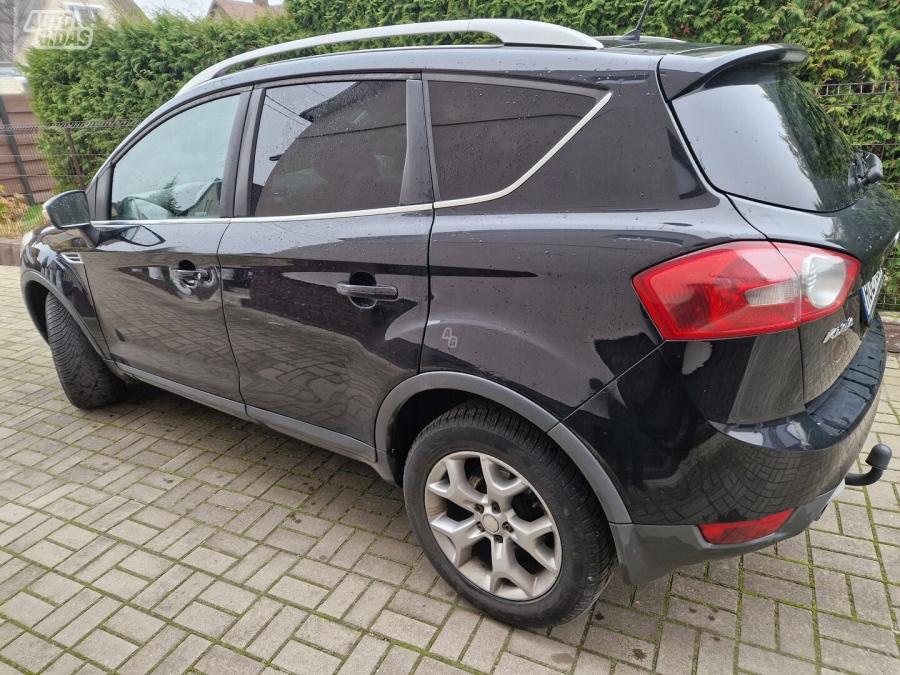 Black Ford Kuga 2009 in Siauliai, with an engine capacity of 2.00 L and mileage of 333 thousand km for 5200 €, photo 8 on AUTOMOTO.COM.LV