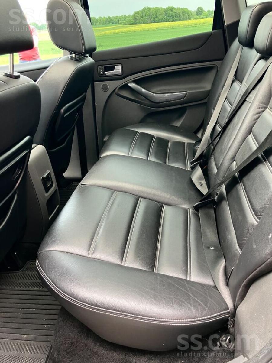 Black Ford Kuga 2009 in Talsi, with an engine capacity of 2.00 L and mileage of 283 thousand km for 5999 €, photo 16 on AUTOMOTO.COM.LV