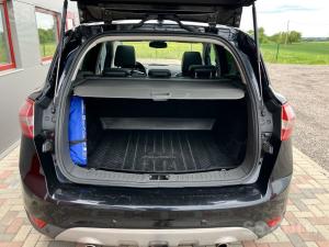 Black Ford Kuga 2009 in Talsi, with an engine capacity of 2.00 L and mileage of 283 thousand km for 5999 €, photo 18 on AUTOMOTO.COM.LV