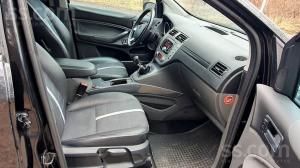Black Ford Kuga 2009 in Riga, with an engine capacity of 2.00 L and mileage of 193 thousand km for 4995 €, photo 12 on AUTOMOTO.COM.LV