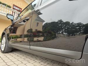 Black Ford Kuga 2009 in Riga, with an engine capacity of 2.00 L and mileage of 229 thousand km for 5950 €, photo 15 on AUTOMOTO.COM.LV