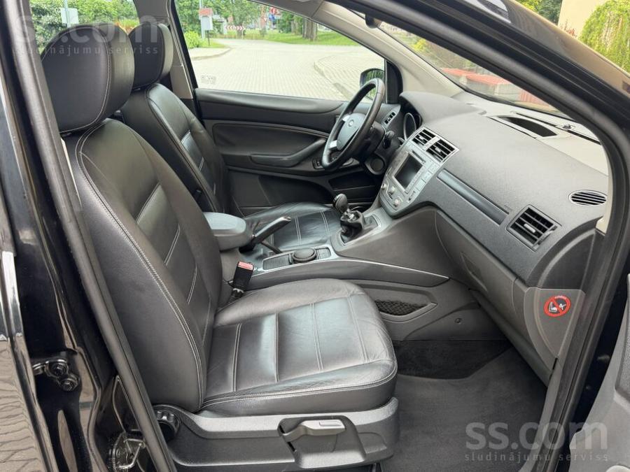 Black Ford Kuga 2009 in Riga, with an engine capacity of 2.00 L and mileage of 229 thousand km for 5950 €, photo 19 on AUTOMOTO.COM.LV