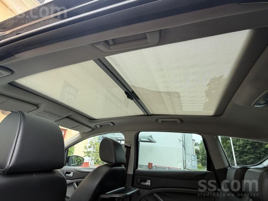 Black Ford Kuga 2009 in Riga, with an engine capacity of 2.00 L and mileage of 229 thousand km for 5950 €, photo 28 on AUTOMOTO.COM.LV
