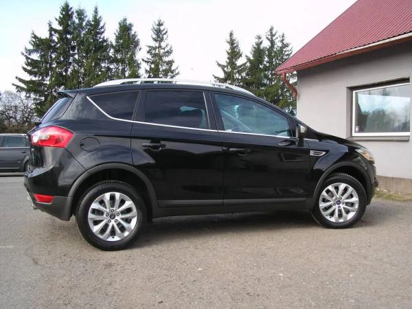 Black Ford Kuga 2009 in Sigulda, with an engine capacity of 2.00 L and mileage of 215 thousand km for 6950 €, photo 3 on AUTOMOTO.COM.LV