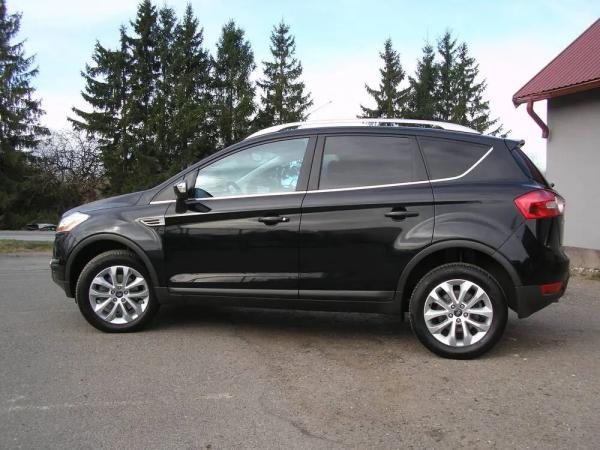 Black Ford Kuga 2009 in Sigulda, with an engine capacity of 2.00 L and mileage of 215 thousand km for 6950 €, photo 4 on AUTOMOTO.COM.LV