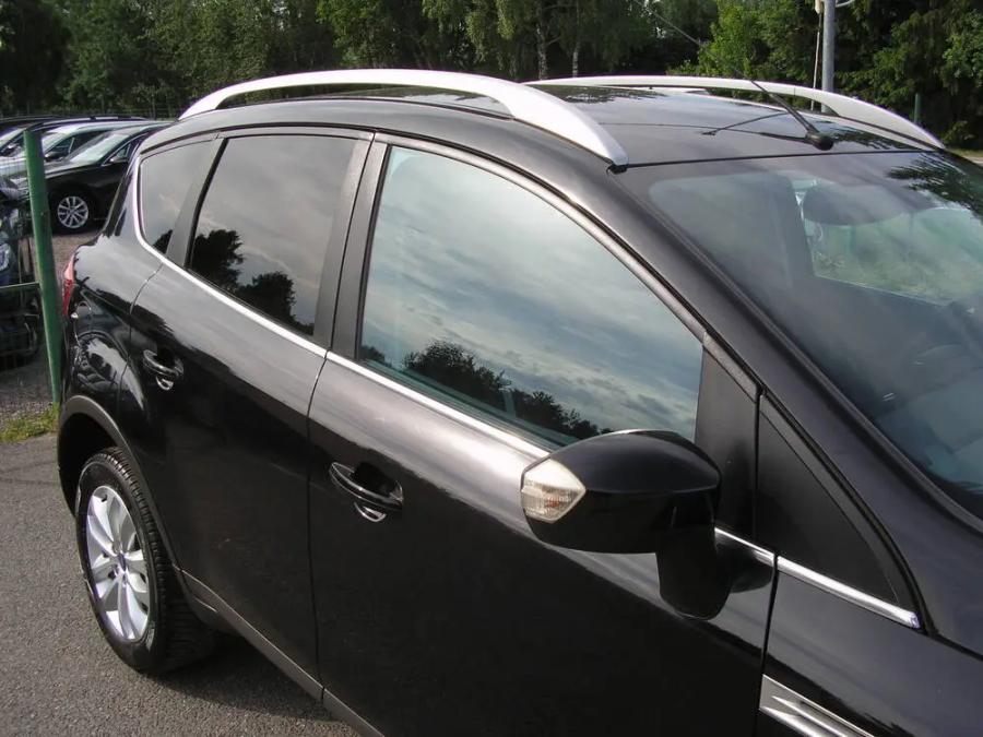 Black Ford Kuga 2009 in Sigulda, with an engine capacity of 2.00 L and mileage of 215 thousand km for 7250 €, photo 12 on AUTOMOTO.COM.LV