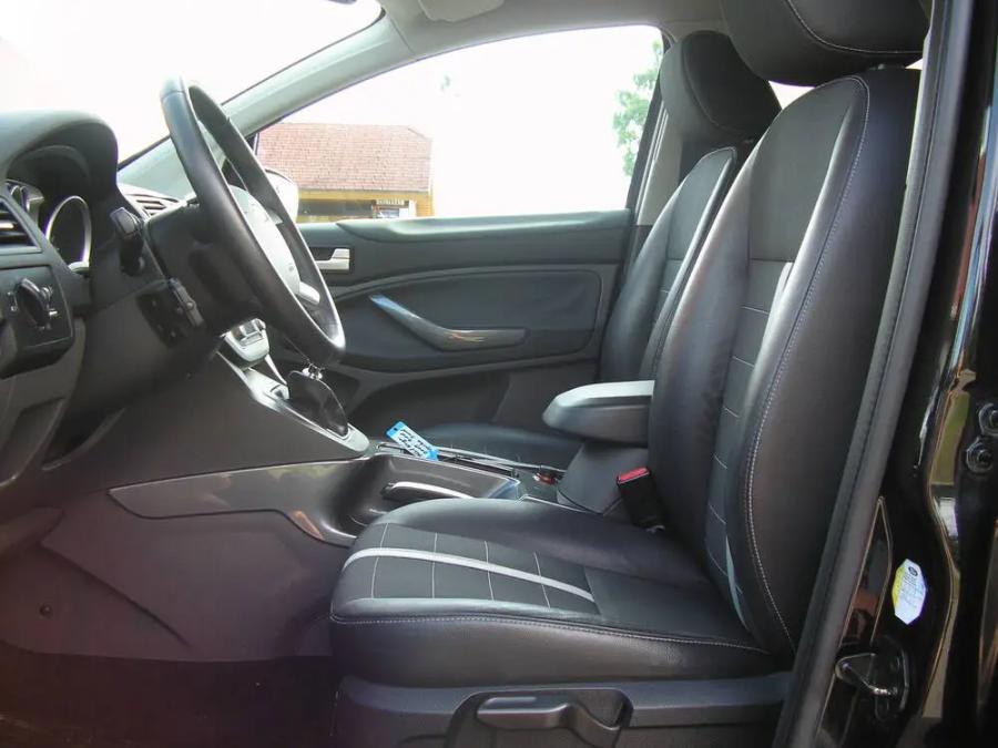 Black Ford Kuga 2009 in Sigulda, with an engine capacity of 2.00 L and mileage of 215 thousand km for 7250 €, photo 19 on AUTOMOTO.COM.LV