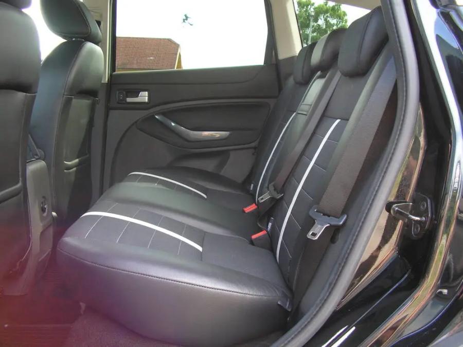 Black Ford Kuga 2009 in Sigulda, with an engine capacity of 2.00 L and mileage of 215 thousand km for 7250 €, photo 20 on AUTOMOTO.COM.LV