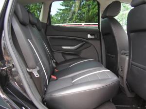 Black Ford Kuga 2009 in Sigulda, with an engine capacity of 2.00 L and mileage of 215 thousand km for 7250 €, photo 24 on AUTOMOTO.COM.LV