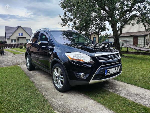 Black Ford Kuga 2009 in Taurage, with an engine capacity of 2.00 L and mileage of 247 thousand km for 4999 €, photo 1 on AUTOMOTO.COM.LV