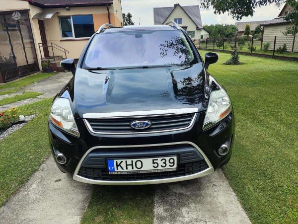 Black Ford Kuga 2009 in Taurage, with an engine capacity of 2.00 L and mileage of 247 thousand km for 4999 €, photo 2 on AUTOMOTO.COM.LV