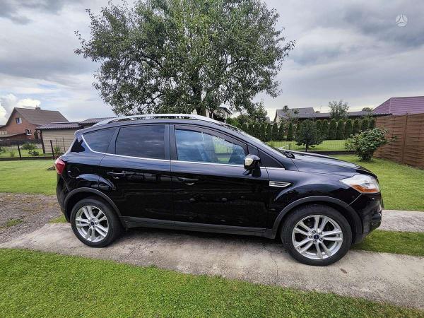 Black Ford Kuga 2009 in Taurage, with an engine capacity of 2.00 L and mileage of 247 thousand km for 4999 €, photo 7 on AUTOMOTO.COM.LV
