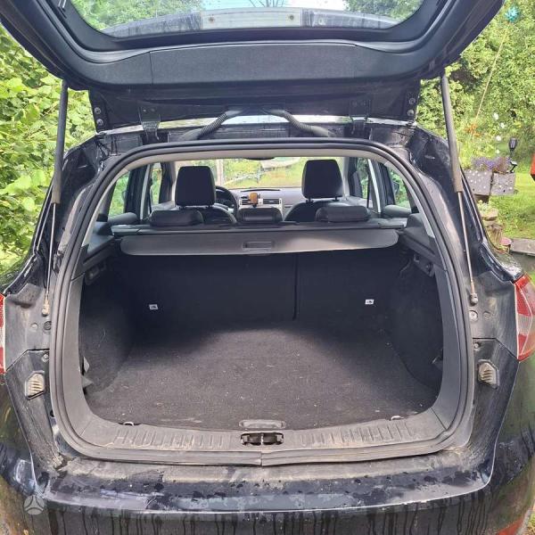 Melns Ford Kuga 2009 Kauņa, ar dzinēja tilpumu 2.00 L un nobraukumu 345 tūkst. km par 3650 €, foto 11 vietnē AUTOMOTO.COM.LV