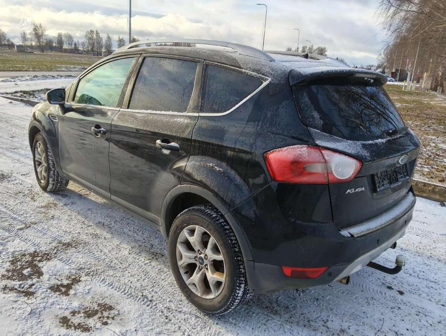 Black Ford Kuga 2010 in Marijampole, with an engine capacity of 2.00 L and mileage of 223 thousand km for 4500 €, photo 12 on AUTOMOTO.COM.LV
