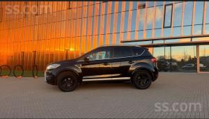 Black Ford Kuga 2010 in Ventspils, with an engine capacity of 2.00 L and mileage of 253 thousand km for 7200 €, photo  on AUTOMOTO.COM.LV