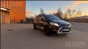 Black Ford Kuga 2010 in Ventspils, with an engine capacity of 2.00 L and mileage of 253 thousand km for 7200 €, photo 3 on AUTOMOTO.COM.LV