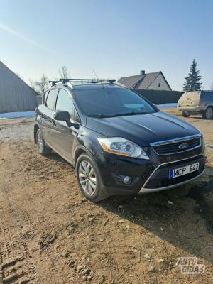 Black Ford Kuga 2010 in Ukmerge, with an engine capacity of 2.00 L and mileage of 260 thousand km for 4200 €, photo 2 on AUTOMOTO.COM.LV