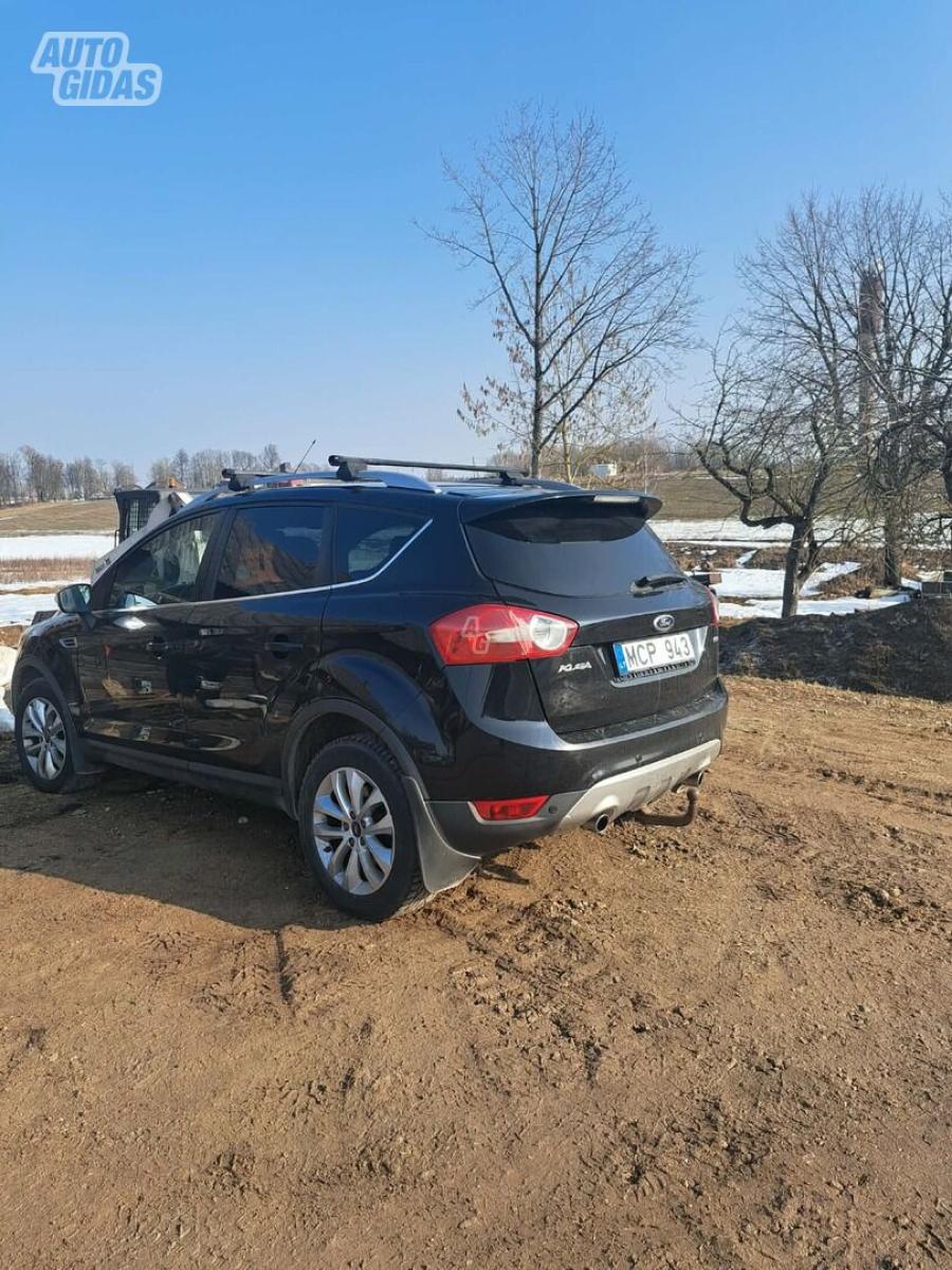 Black Ford Kuga 2010 in Ukmerge, with an engine capacity of 2.00 L and mileage of 260 thousand km for 4200 €, photo 3 on AUTOMOTO.COM.LV