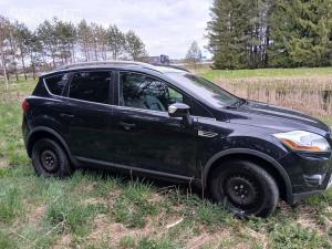 Black Ford Kuga 2010 in Vilnius, with an engine capacity of 2.00 L and mileage of 212 thousand km for 3500 €, photo 3 on AUTOMOTO.COM.LV