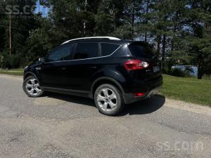 Black Ford Kuga 2010 in Riga, with an engine capacity of 2.00 L and mileage of 262 thousand km for 4500 €, photo 7 on AUTOMOTO.COM.LV