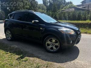 Black Ford Kuga 2010 in Riga, with an engine capacity of 2.00 L and mileage of 262 thousand km for 4500 €, photo 12 on AUTOMOTO.COM.LV