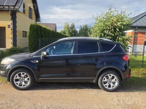 Black Ford Kuga 2010 in Riga, with an engine capacity of 2.50 L and mileage of 132 thousand km for 7200 €, photo 7 on AUTOMOTO.COM.LV