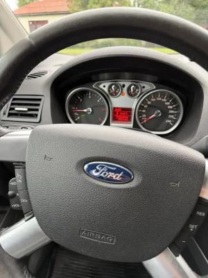 Black Ford Kuga 2011 in Ventspils, with an engine capacity of 2.00 L and mileage of 288 thousand km for 5590 €, photo 11 on AUTOMOTO.COM.LV