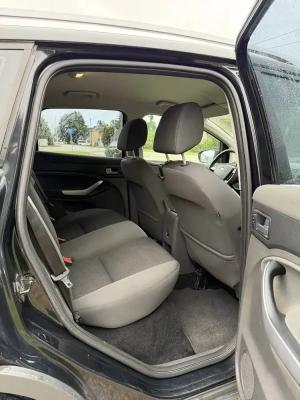 Black Ford Kuga 2011 in Ventspils, with an engine capacity of 2.00 L and mileage of 288 thousand km for 5590 €, photo 18 on AUTOMOTO.COM.LV