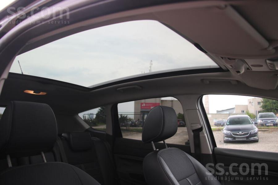 Black Ford Kuga 2011 in Tukums, with an engine capacity of 2.00 L and mileage of 245 thousand km for 6999 €, photo 23 on AUTOMOTO.COM.LV