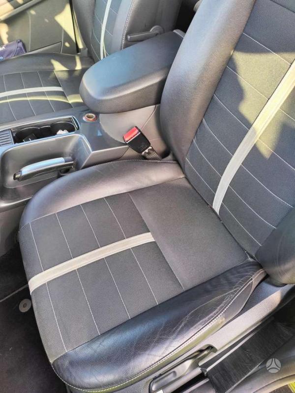 Black Ford Kuga 2012 in Kedainiai, with an engine capacity of 2.00 L and mileage of 176 thousand km for 6099 €, photo 1 on AUTOMOTO.COM.LV