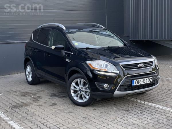 Black Ford Kuga 2012 in Riga, with an engine capacity of 2.00 L and mileage of 236 thousand km for 6800 €, photo 2 on AUTOMOTO.COM.LV