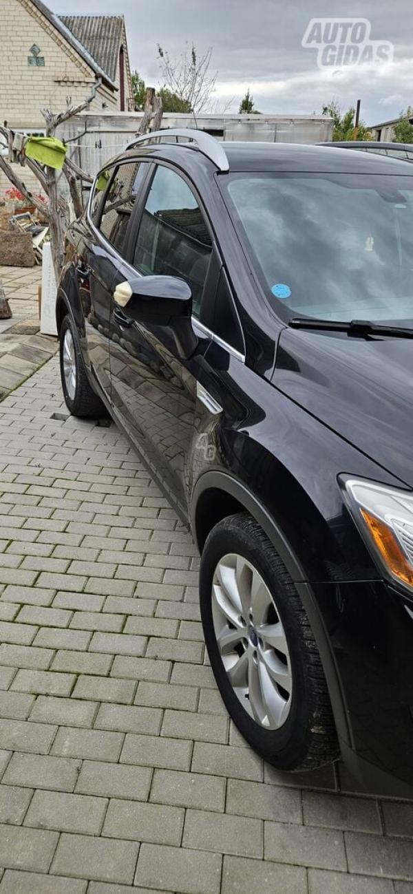 Black Ford Kuga 2012 in Pasvalys, with an engine capacity of 2.00 L and mileage of 245 thousand km for 4500 €, photo 5 on AUTOMOTO.COM.LV