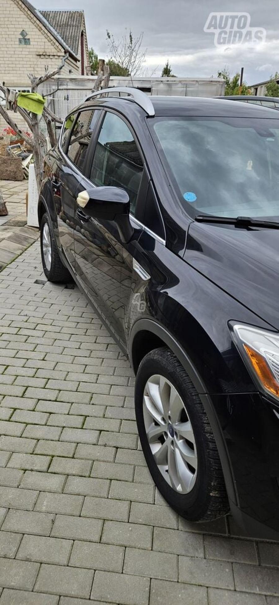 Black Ford Kuga 2012 in Pasvalys, with an engine capacity of 2.00 L and mileage of 245 thousand km for 4500 €, photo 5 on AUTOMOTO.COM.LV