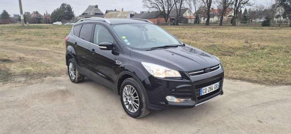 Black Ford Kuga 2013 in Taurage, with an engine capacity of 2.00 L and mileage of 146 thousand km for 7900 €, photo 2 on AUTOMOTO.COM.LV