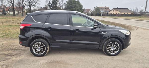 Black Ford Kuga 2013 in Taurage, with an engine capacity of 2.00 L and mileage of 146 thousand km for 7900 €, photo 3 on AUTOMOTO.COM.LV