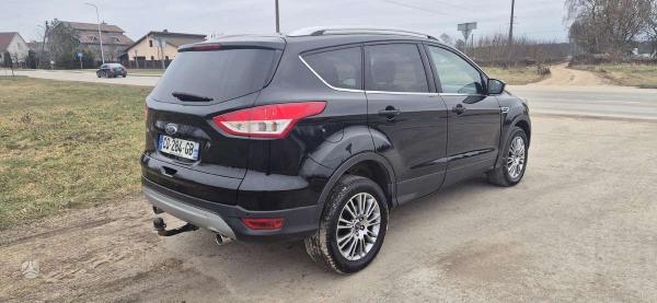 Black Ford Kuga 2013 in Taurage, with an engine capacity of 2.00 L and mileage of 146 thousand km for 7900 €, photo 4 on AUTOMOTO.COM.LV