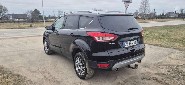 Black Ford Kuga 2013 in Taurage, with an engine capacity of 2.00 L and mileage of 146 thousand km for 7900 €, photo 6 on AUTOMOTO.COM.LV