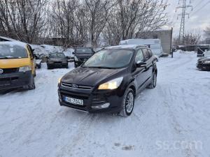 Black Ford Kuga 2013 in Riga, with an engine capacity of 2.00 L and mileage of 213 thousand km for 8490 €, photo  on AUTOMOTO.COM.LV
