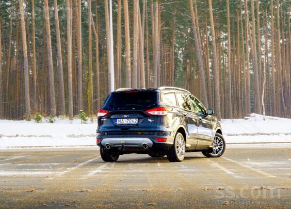 Black Ford Kuga 2013 in Riga, with an engine capacity of 2.00 L and mileage of 213 thousand km for 7590 €, photo 5 on AUTOMOTO.COM.LV