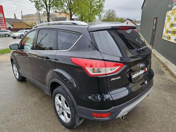 Black Ford Kuga 2013 in Siauliai, with an engine capacity of 2.00 L and mileage of 191 thousand km for 7950 €, photo 5 on AUTOMOTO.COM.LV