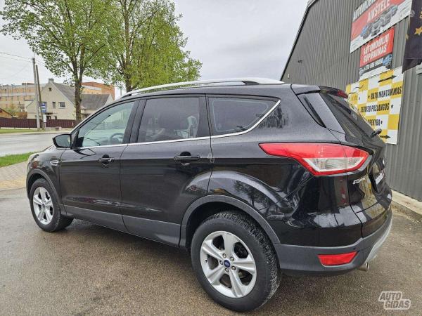 Black Ford Kuga 2013 in Siauliai, with an engine capacity of 2.00 L and mileage of 191 thousand km for 7950 €, photo 6 on AUTOMOTO.COM.LV