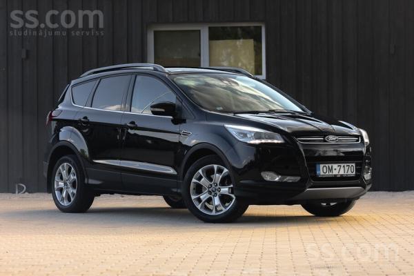 Black Ford Kuga 2013 in Jelgava, with an engine capacity of 2.00 L and mileage of 246 thousand km for 9900 €, photo 1 on AUTOMOTO.COM.LV